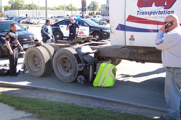 Video: Woman trapped under semi, rescued by firefighters | Local News ...