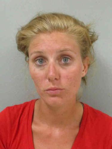 Two arrested for threatening people at Elgin home