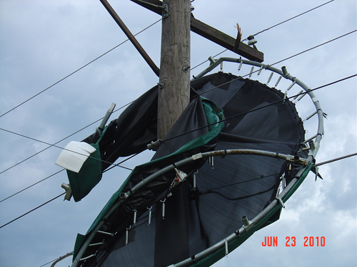 PHOTOS: Trampoline gets lodged in Waverly power lines