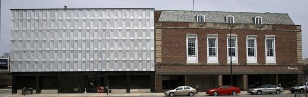 Developers settle suit over former Courier building