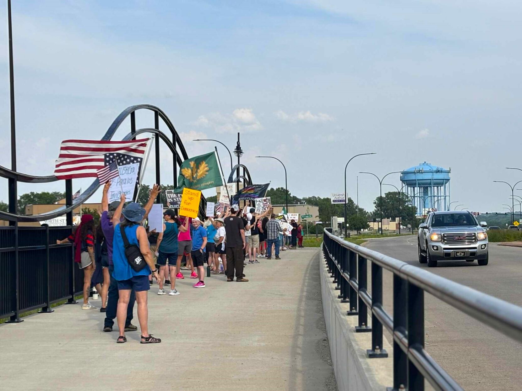 Cedar Valley protests show solidarity with LA, immigrants