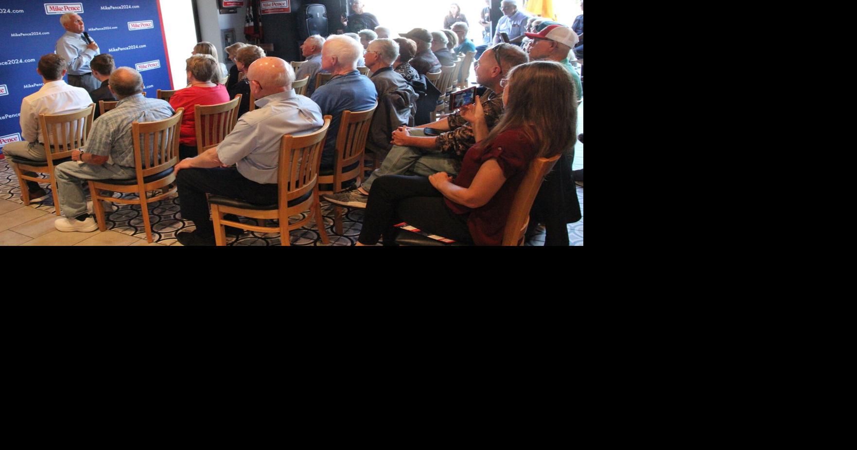 Pence campaigns at Starbeck's Smokehouse in Waterloo stop