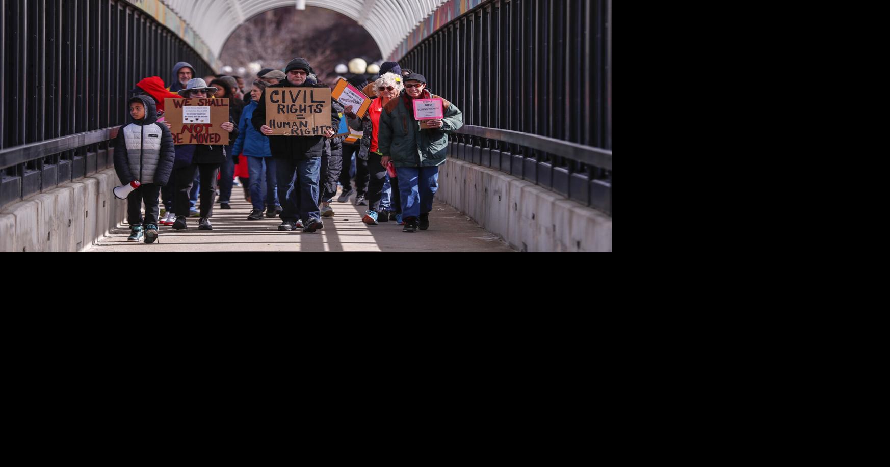 Human rights advocates in Waterloo reenact famous 1965 voting rights march