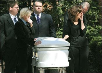 1,000 attend funeral for man, slain family