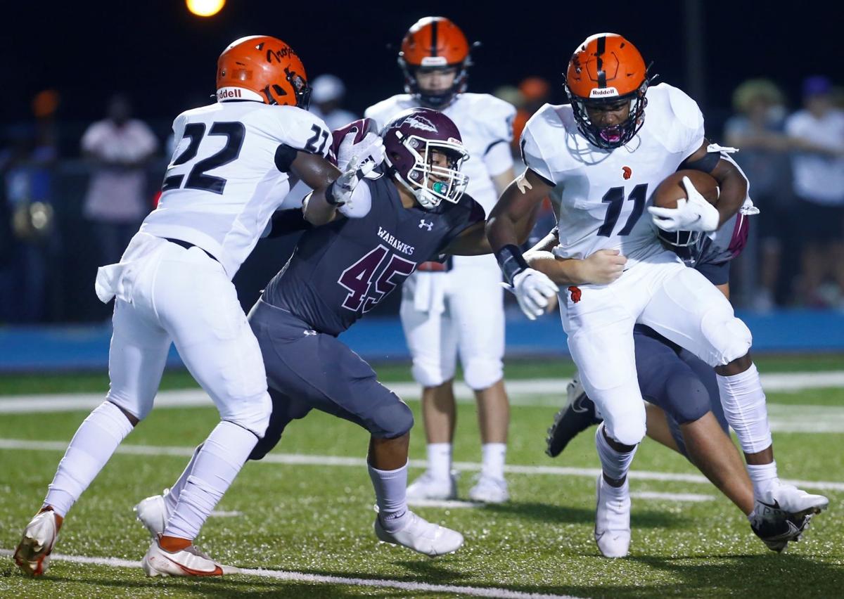 East coach aims for team of athletic scholars