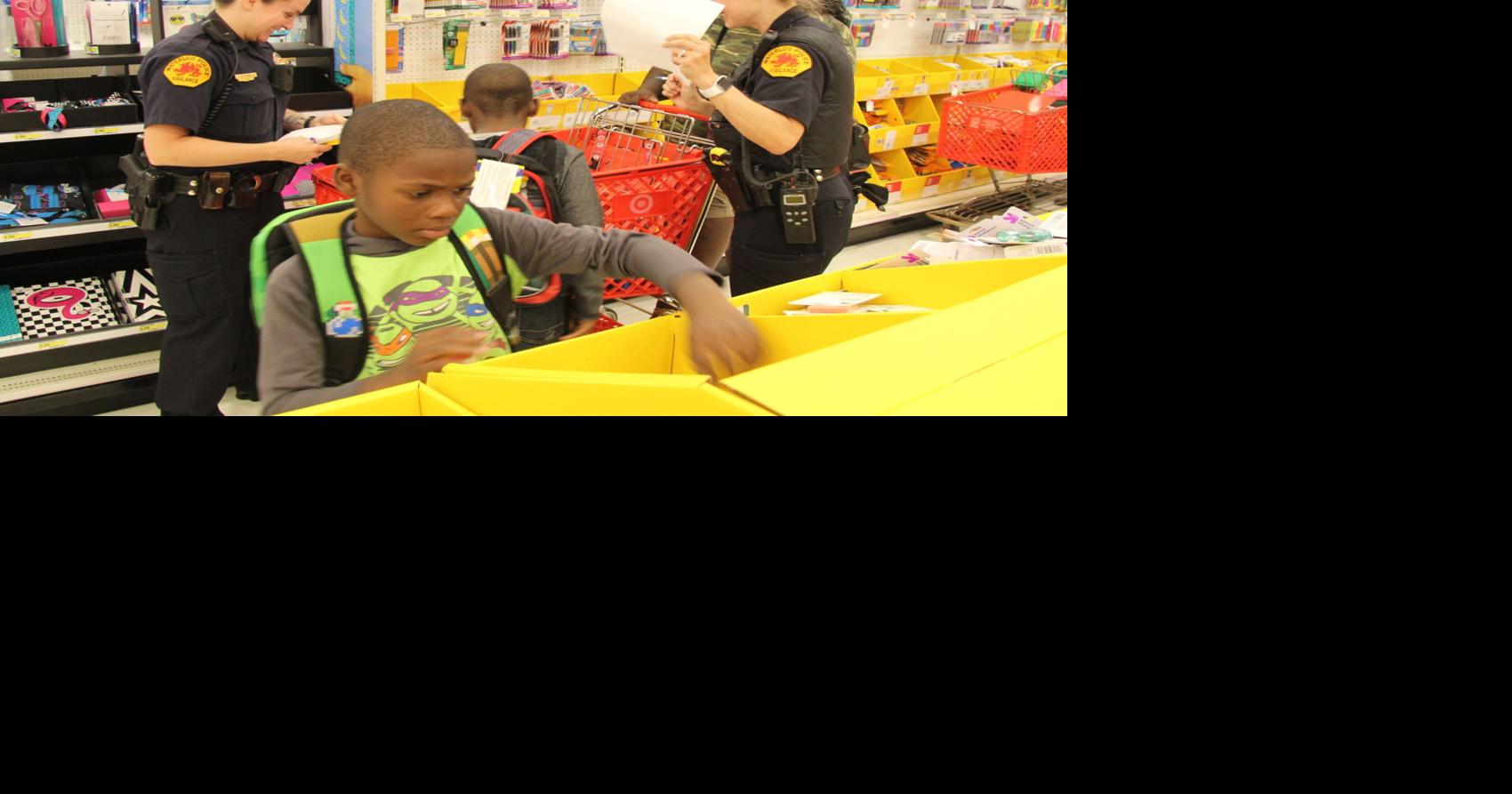 Police shopping event prepares students for school