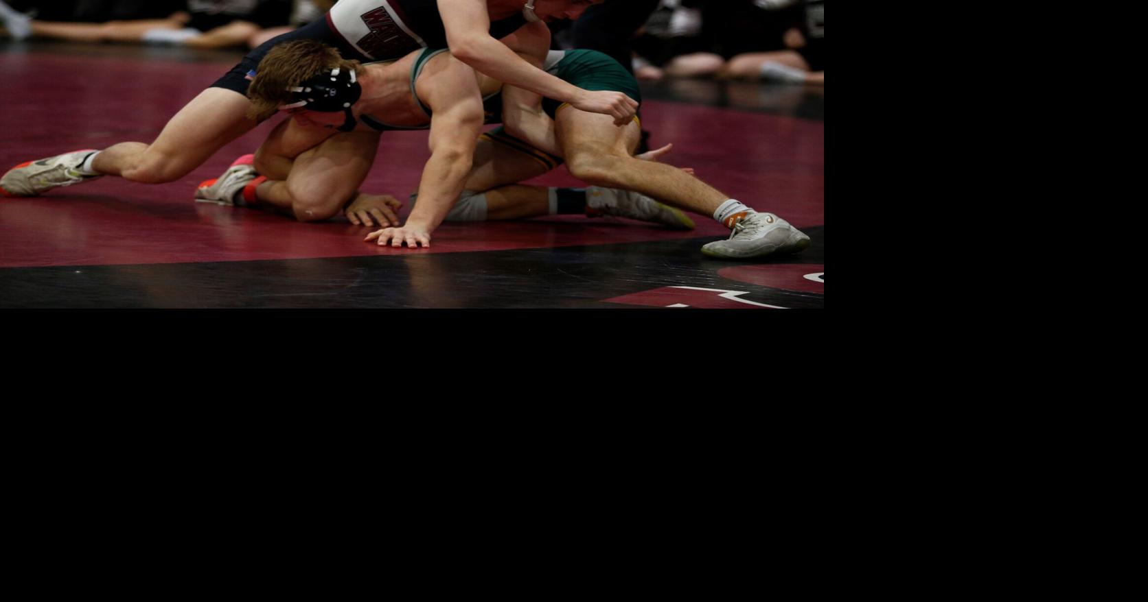 High School Wrestling: West's Cooper Paxton claims MVC crown