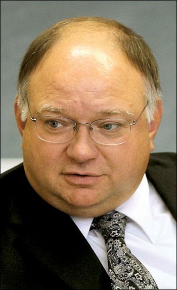 Trimmer Liberty Bank selling branches