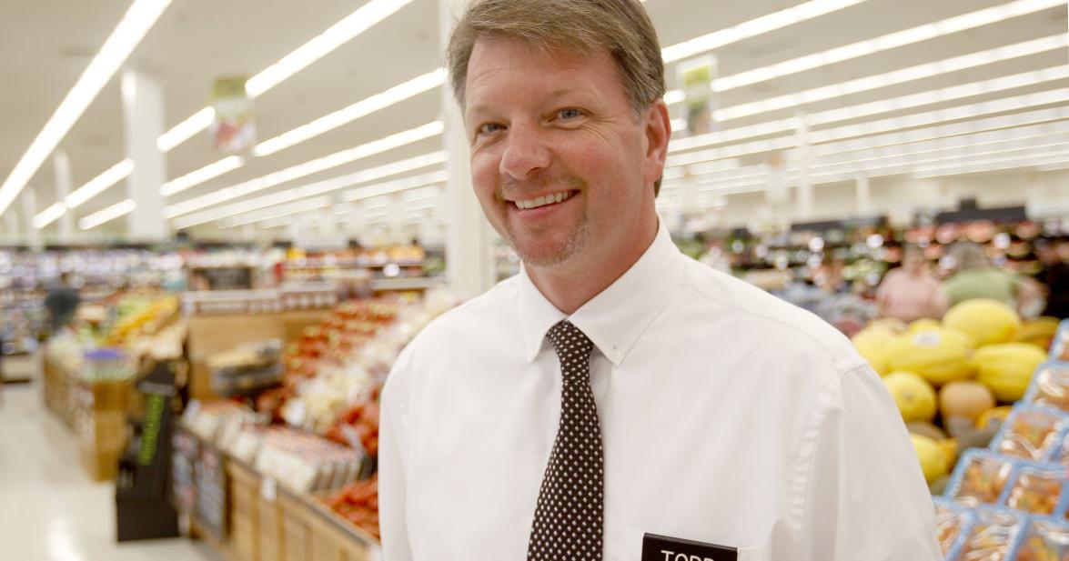 Double duty: Hy-Vee store director is father of nine