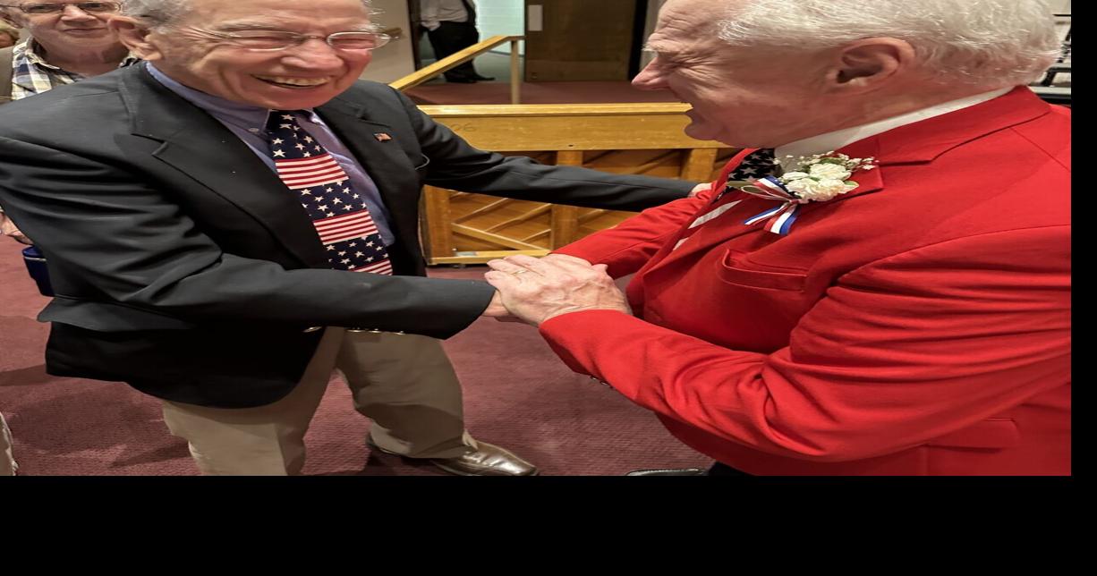 Nelson leads final concert at Waterloo Christian School.
