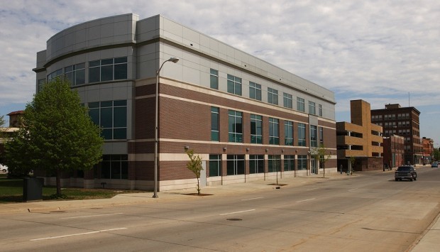 Courier plans move to new downtown site -- Waterloo Industries building