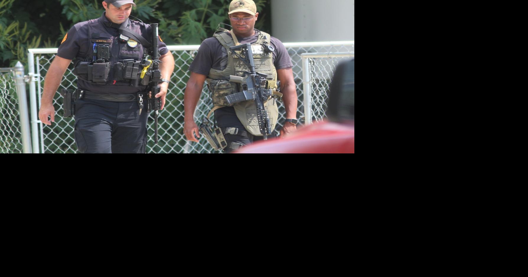 Police search home for wanted suspect