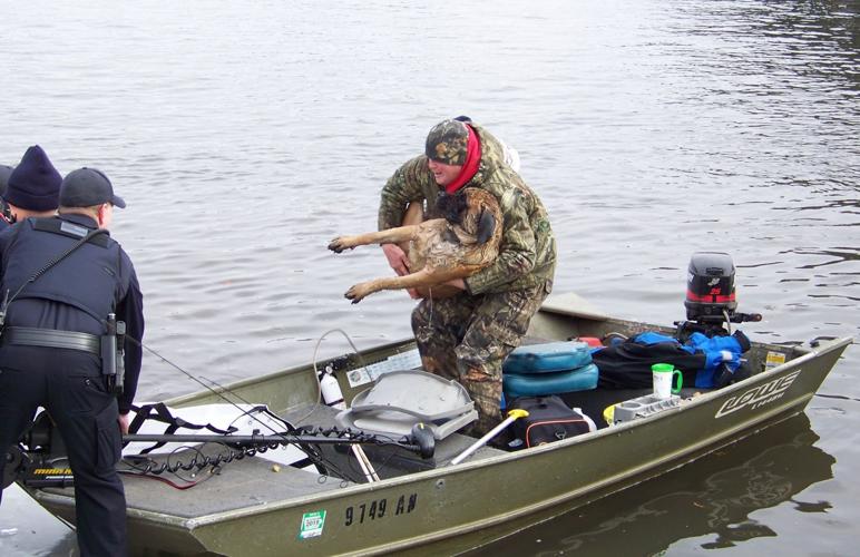 VIDEO: Fishermen rescue dog from frigid river