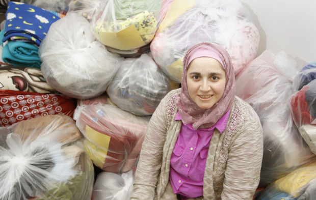 Iowans Donate Clothing To Help Syrian Refugees Affected By Conflict