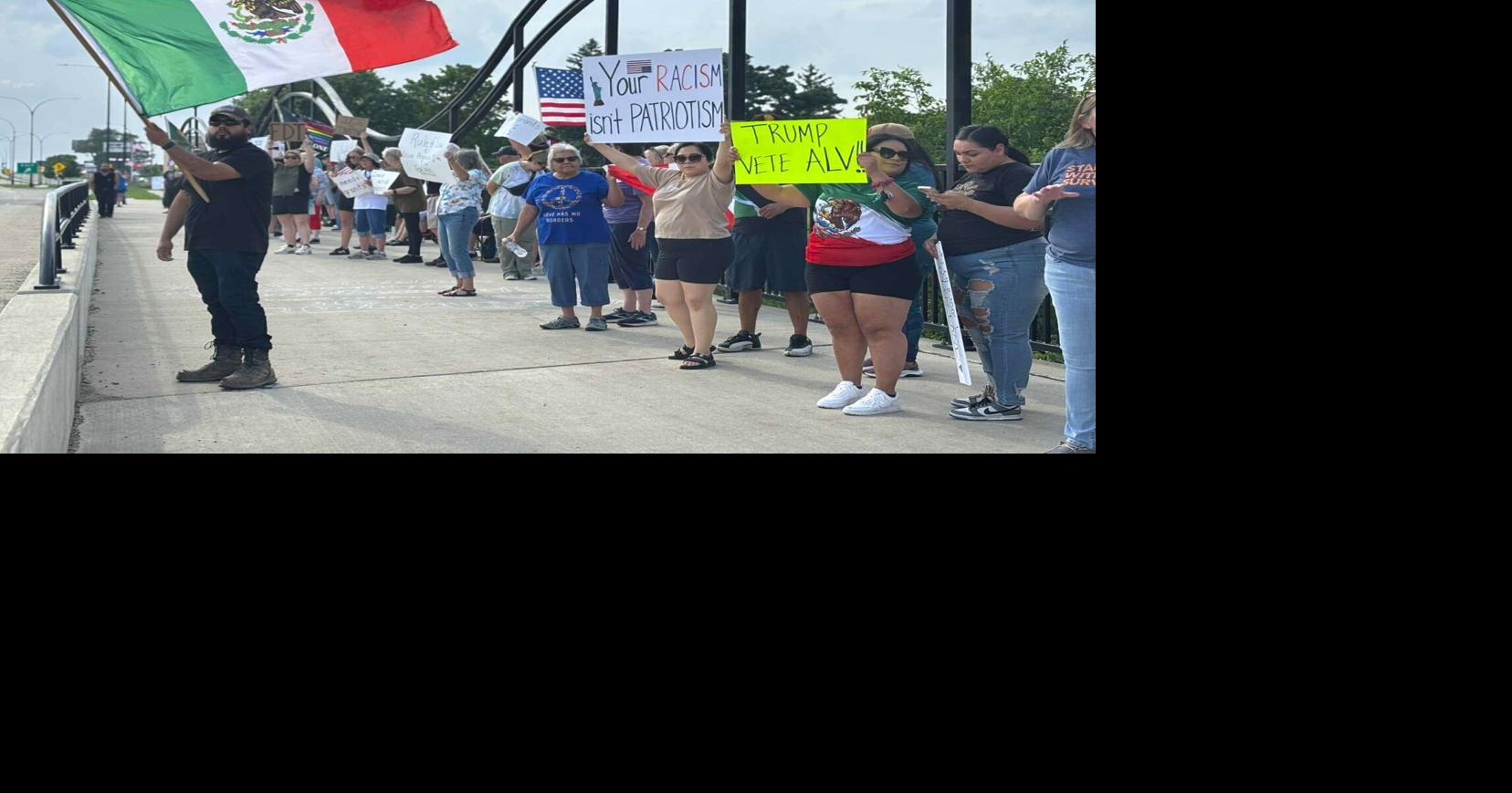 Cedar Valley protests show solidarity with LA, immigrants