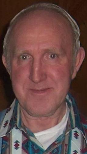 Charles E. May (1943-2014)