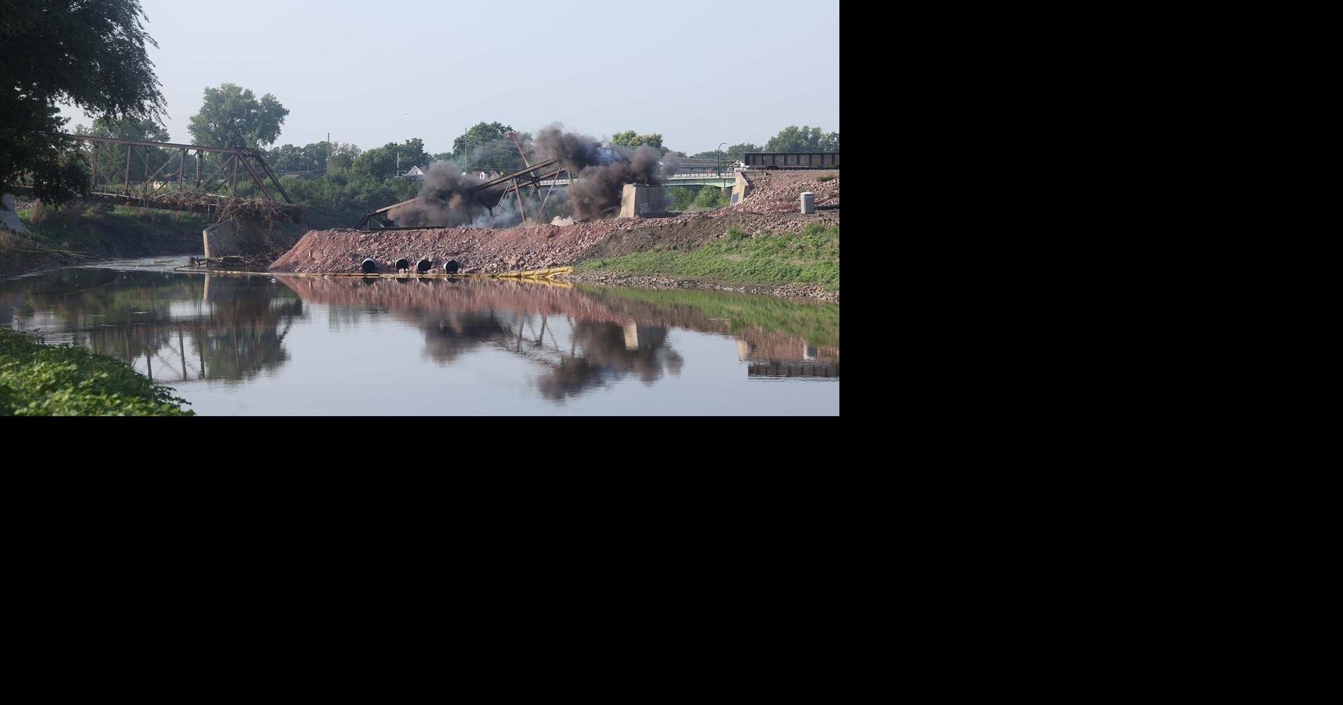 SLIDESHOW: Controlled demolition of flood damaged bridge