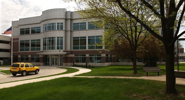 Courier plans move to new downtown site -- Waterloo Industries building