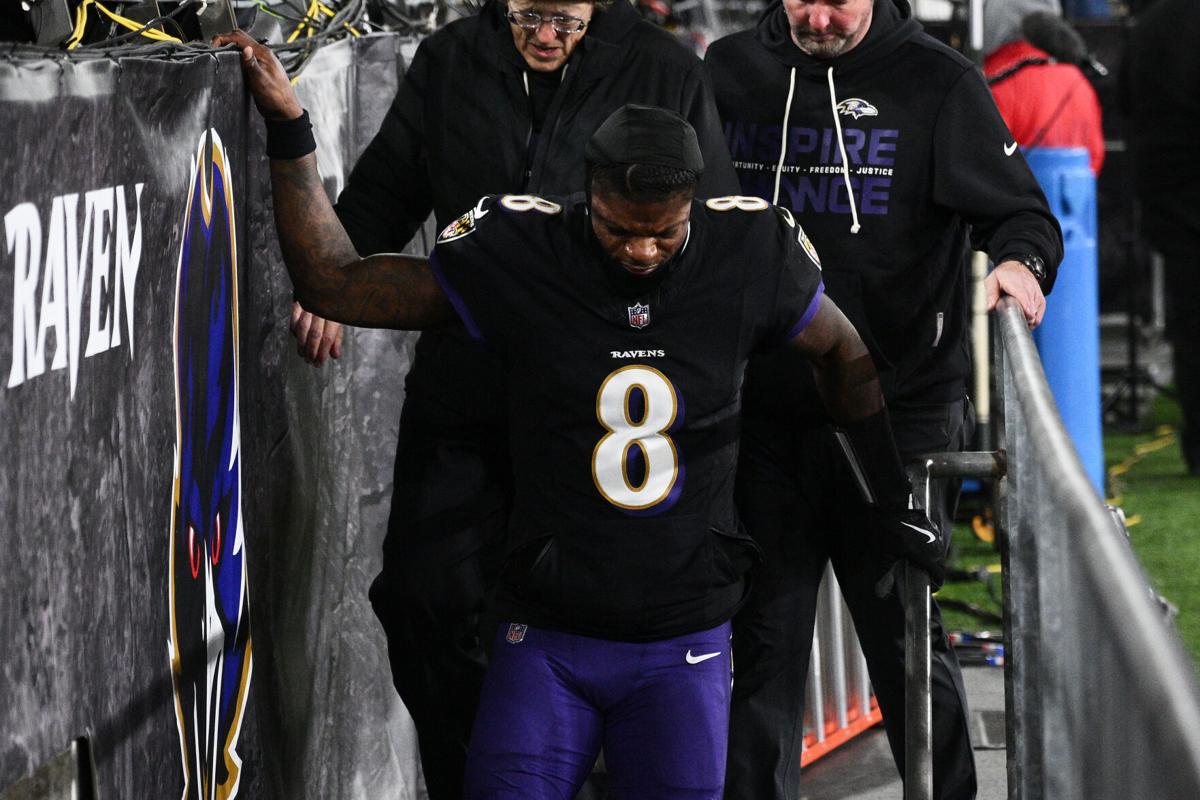 Ravens' Lamar Jackson absent from practice Wednesday following last ...