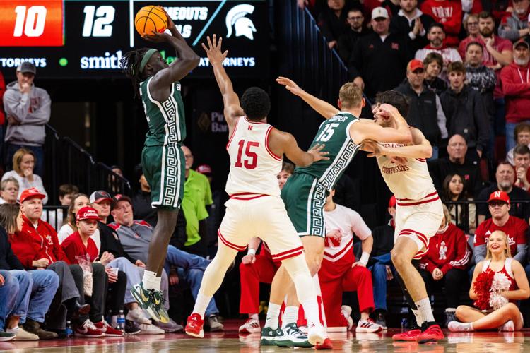 No. 13 Nebraska remains unbeaten with 58-56 win over No. 13 Spartans ...