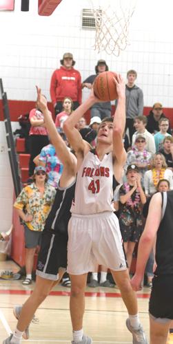 Falcons take care of business in regulation in win over Trojans | Local ...