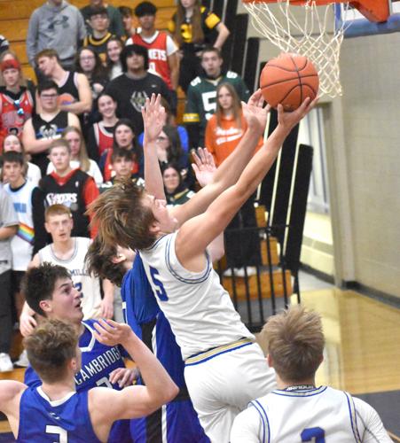 Boys basketball: Staunch defense, early 3-pointers send Lake Mills past ...