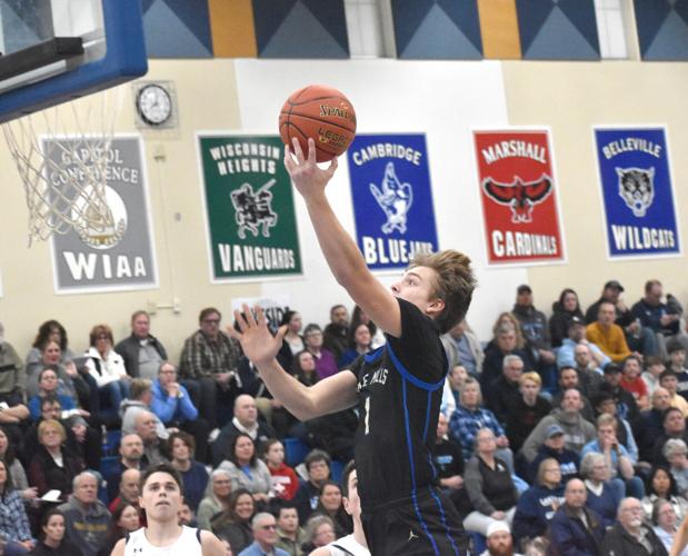 Bender reaches 2,000-point mark as Lake Mills earns long-awaited road ...