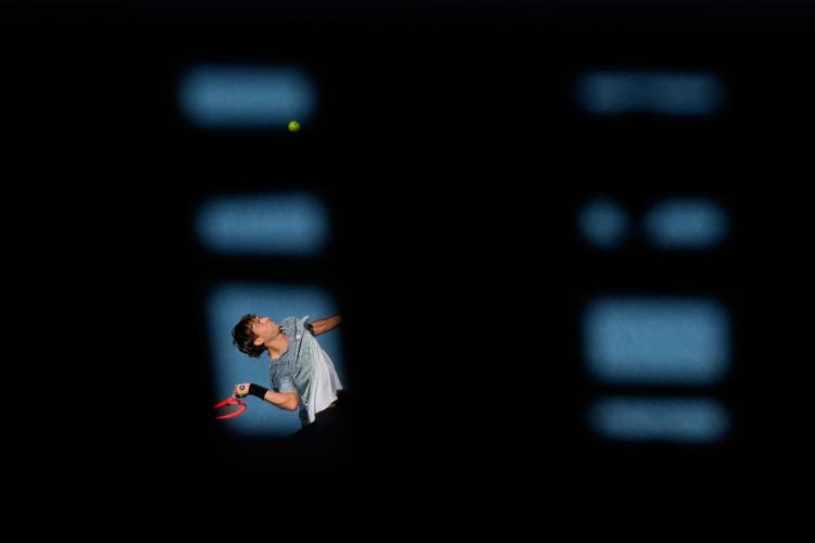 Australian Open photos show shafts of light at Melbourne Park ...