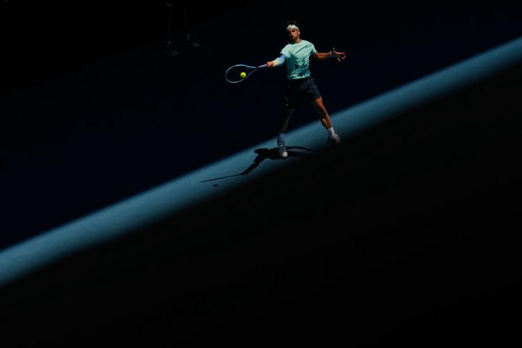 Australian Open photos show shafts of light at Melbourne Park ...