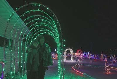 Watertown couple creates colorful winter wonderland with holiday light ...