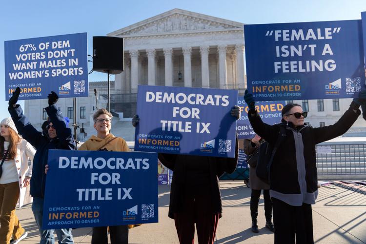 Photos of demonstrators outside the Supreme Court as it considers ...