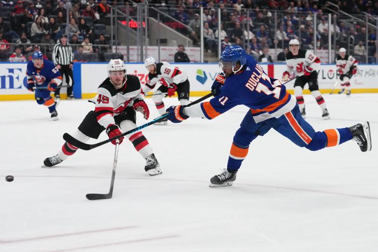 Anthony Duclair has a hat trick and two assists as the Islanders rout ...
