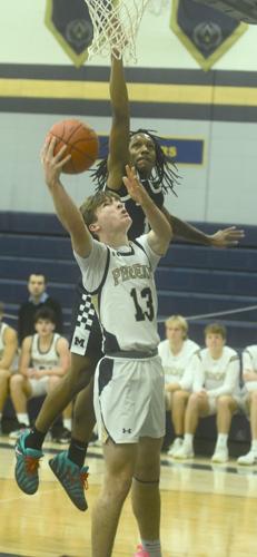 Boys basketball: Phoenix outrace Bishops to kick off new year | Local ...