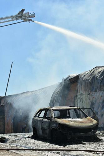 Multiple departments battle Grandview structure fire ...