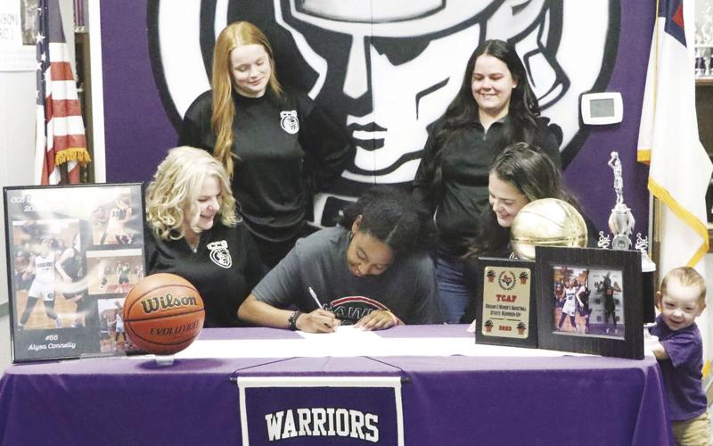 PHOTOS: Community Christian's Alysa Connelly and Kate Buchanan signing ...