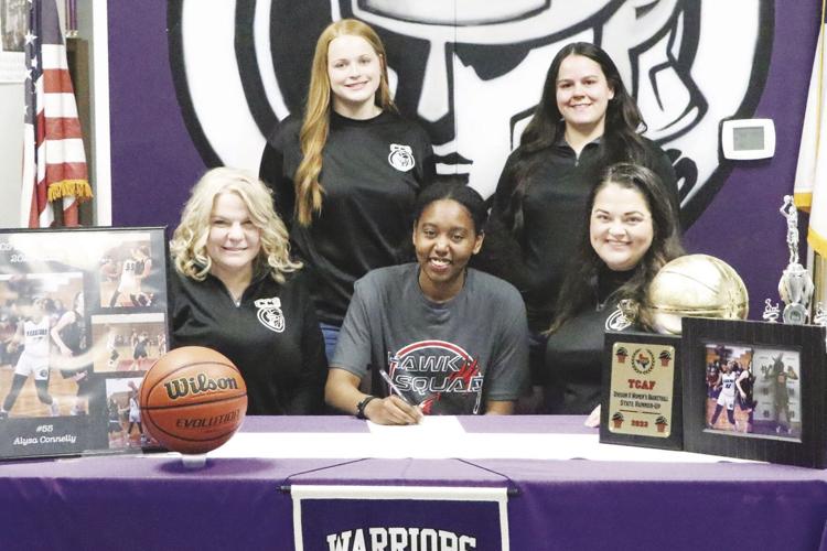 PHOTOS: Community Christian's Alysa Connelly and Kate Buchanan signing ...