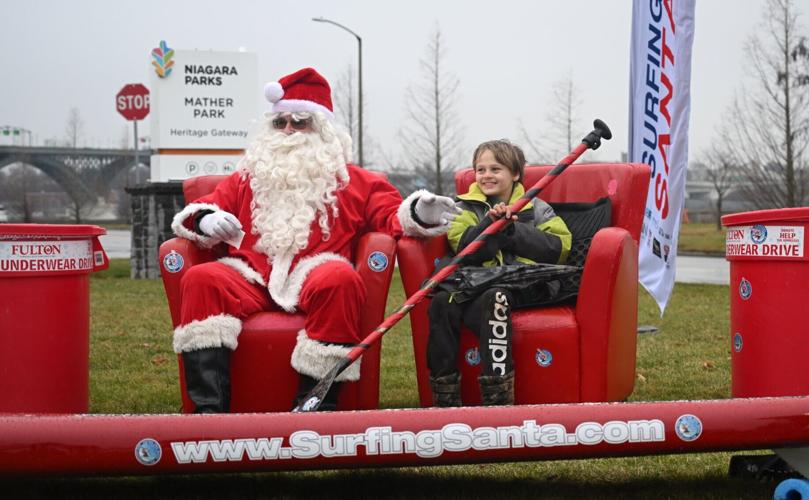 Surfing Santa paddles to raise awareness of homelessness