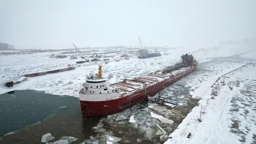 Photos: Icebreaker, tug lead cargo ship out of Welland Canal