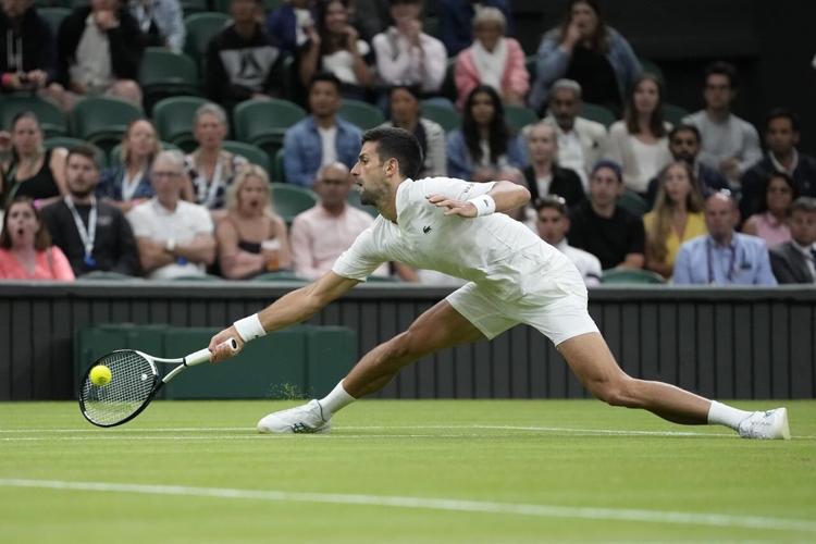 Novak Djokovic plays at Wimbledon with the number ‘23’ printed on his ...