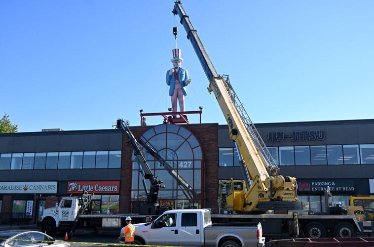 Iconic Uncle Sam statue comes down for new paint job