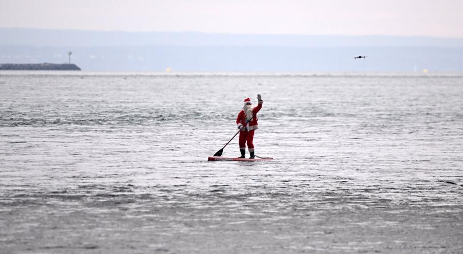 Surfing Santa paddles to raise awareness of homelessness