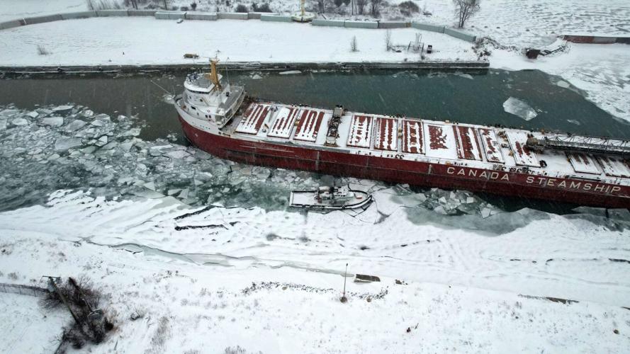 Photos: Icebreaker, tug lead cargo ship out of Welland Canal