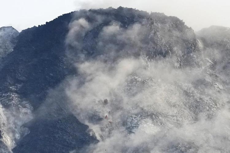 Philippine villagers flee ashfall, sight of red-hot lava from erupting ...