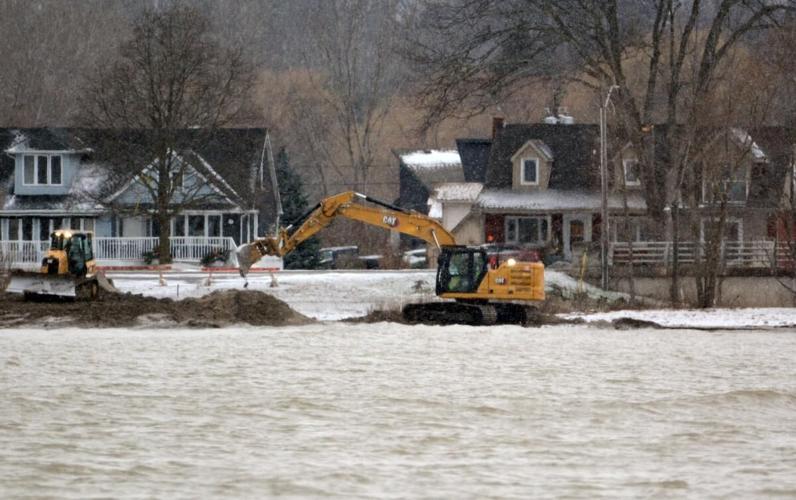 Photos: Clearing out the Eagle Marsh Drain