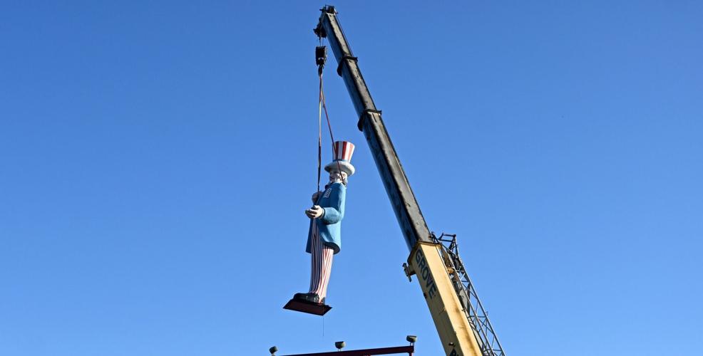 Iconic Uncle Sam statue comes down for new paint job