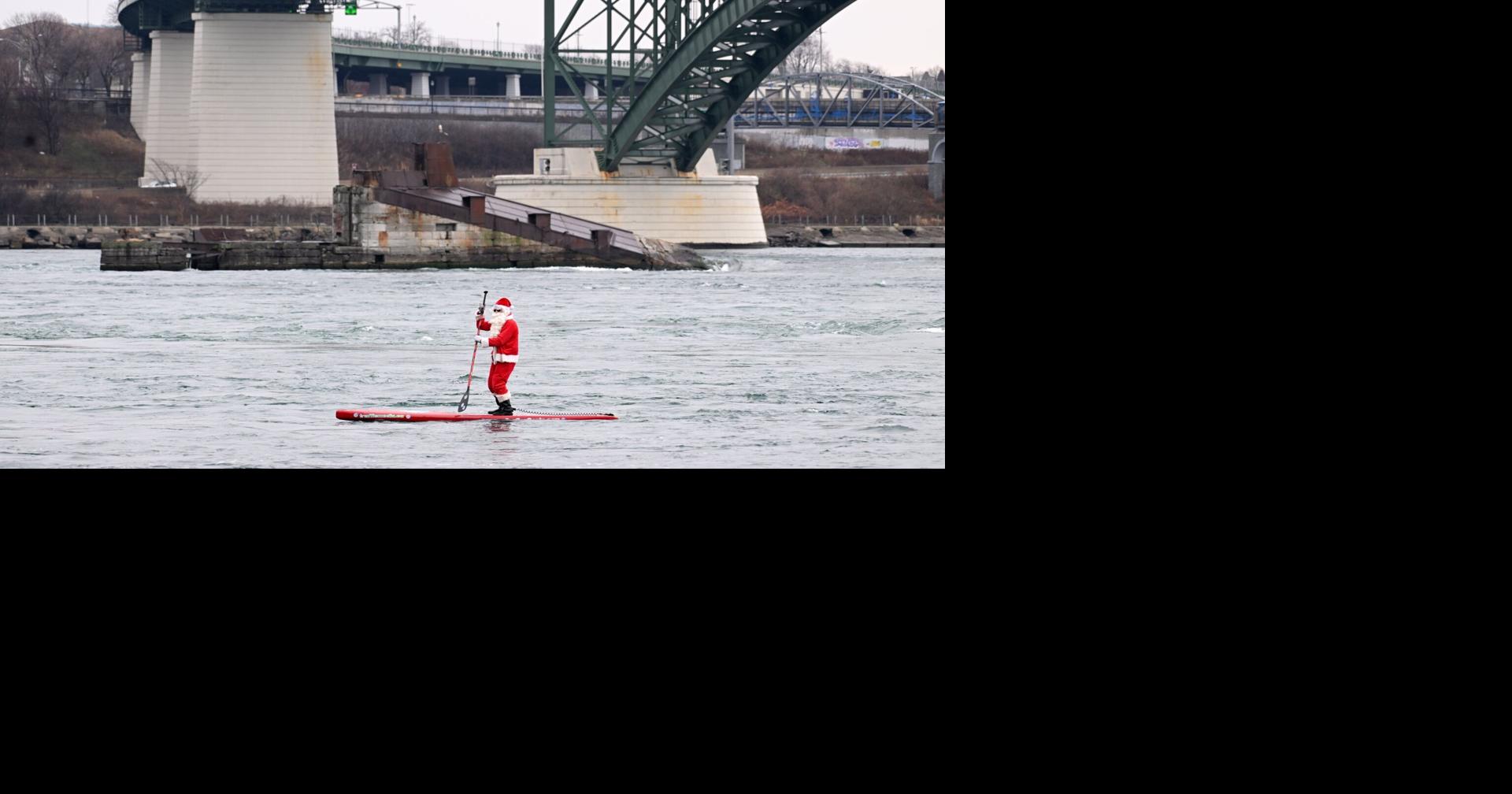 Surfing Santa paddles to raise awareness of homelessness