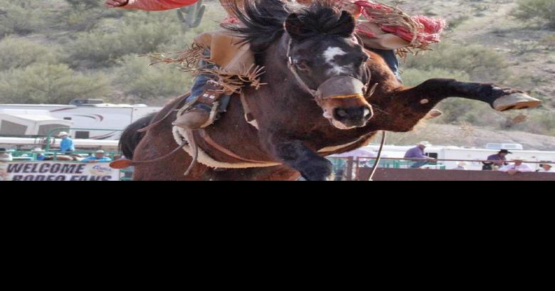 Cody Mooney makes an eight-second ride at the Gold Rush Days rodeo on ...