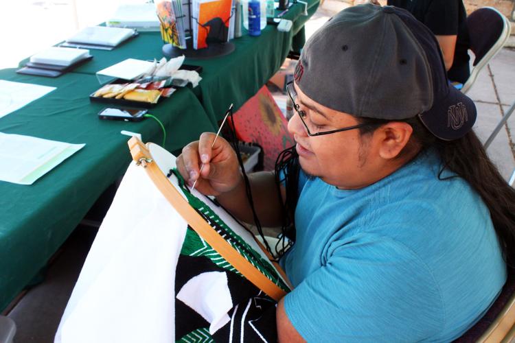 Artisan Elroy Natachu Jr. uses traditional weaving methods to link Zuni ...