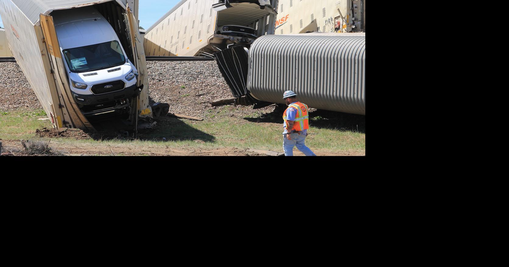 23 freight cars, dozens of new vehicles damaged in BNSF train ...
