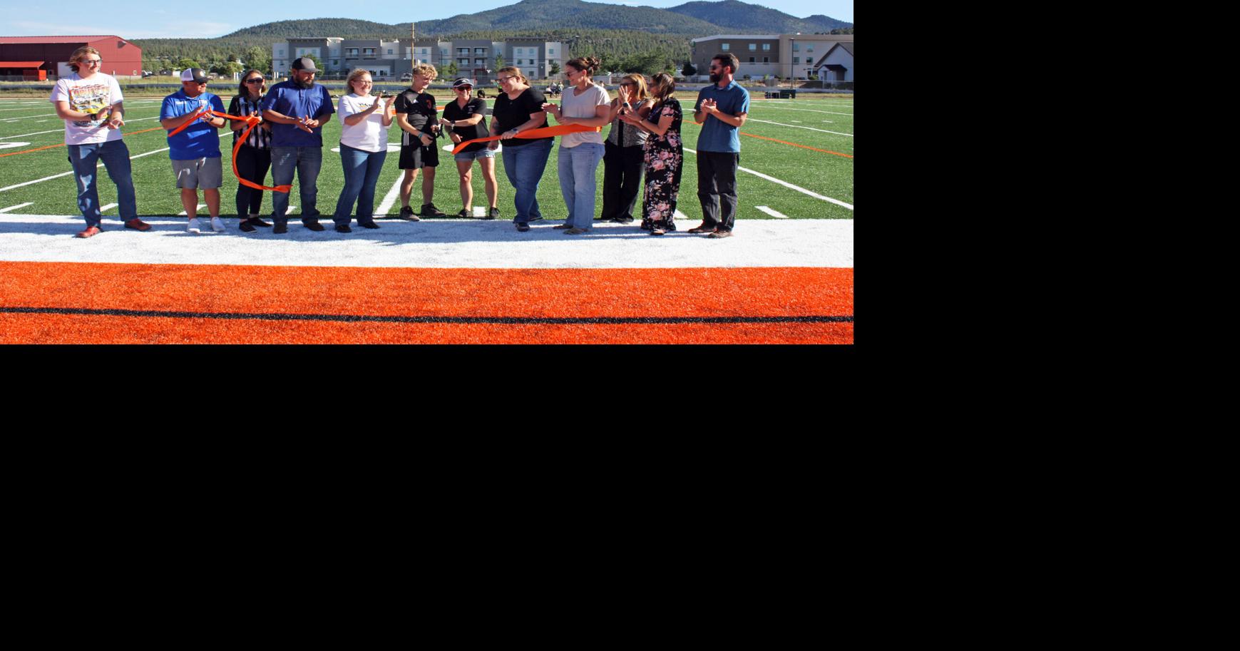 Ribbon cutting marks 'milestone' grand opening of new turf field ...